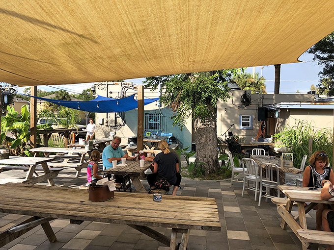 The outdoor seating area offers Florida's favorite dining combination: fresh seafood and fresh air. Those shade sails aren't just practical&mdash;they're a kindness.
