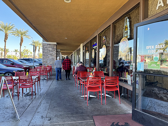 Desert dining gets an upgrade with these cheerful red chairs. Palm trees and burgers &ndash; a California dream team.