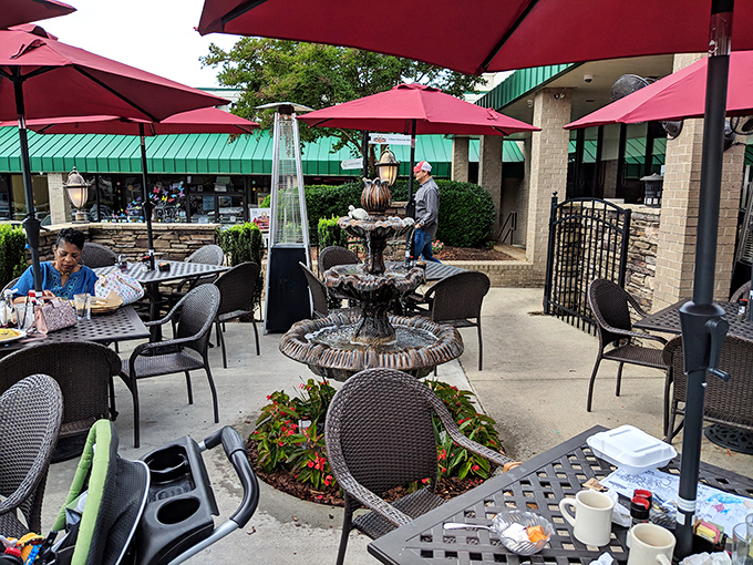 Outdoor dining where umbrellas create little islands of shade, perfect for enjoying breakfast while soaking up South Carolina sunshine.