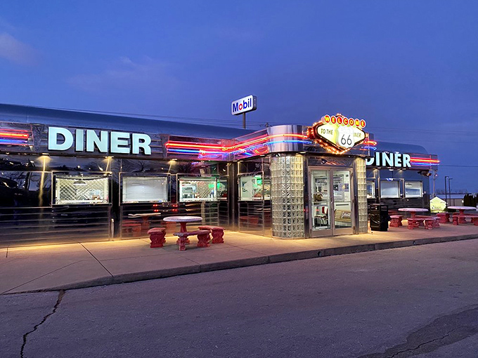 As night falls, the neon comes alive, beckoning hungry travelers like a lighthouse for those lost in a sea of chain restaurants.