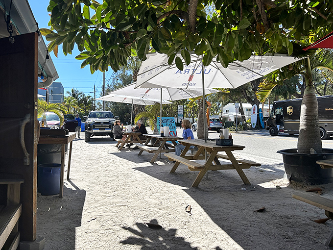 Outdoor dining under Florida skies, where picnic tables and palm trees create the perfect setting for a burger-induced siesta.