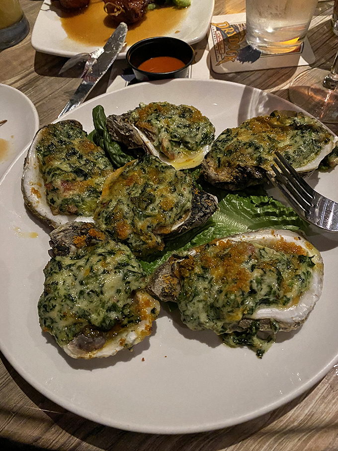 Oysters Rockefeller so decadently topped with spinach and cheese, they make ordinary oysters seem like they're not even trying.
