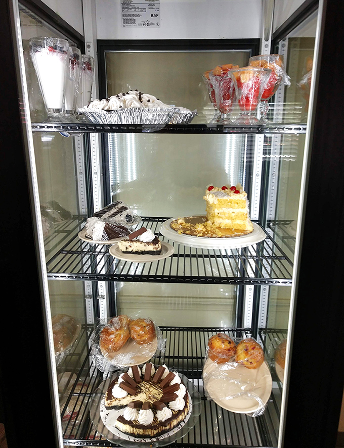 A dessert case that should come with a warning label: "May cause spontaneous happiness and the undoing of belt notches."