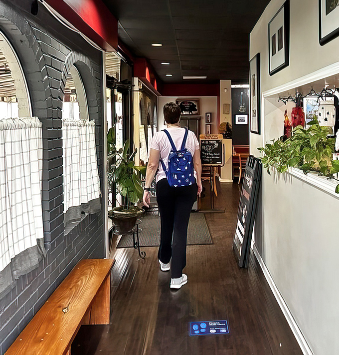The entrance hallway feels like a warm-up act, building anticipation with each step toward the main breakfast attraction.