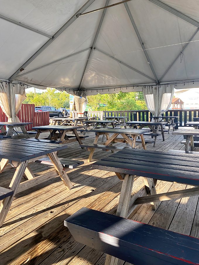 Picnic tables under a protective tent offer casual dining with a view. This is where memories of perfect summer days are made.