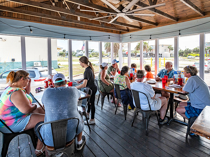 The screened patio offers the perfect compromise&mdash;all the fresh air of outdoor dining without uninvited flying guests joining your table. Pure Florida genius.