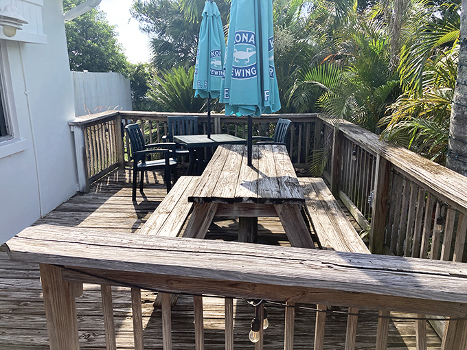 Florida dining doesn't get more authentic than this wooden deck seating area, where palm trees provide the backdrop for outdoor meals in the gentle breeze.