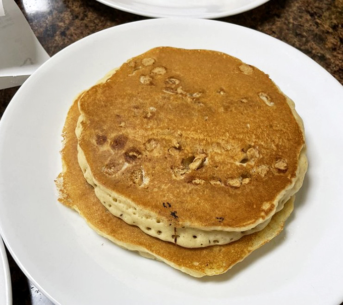 These pancakes aren't just breakfast, they're therapy&mdash;golden-brown with perfect bubble patterns that whisper, "The day's problems can wait until after coffee."