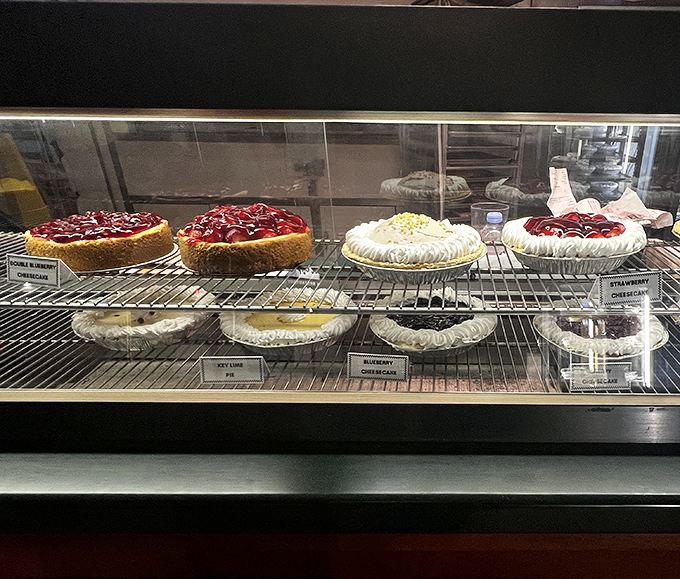 The display case: where decision paralysis meets pure joy. "I'll take one of each" is a common thought.