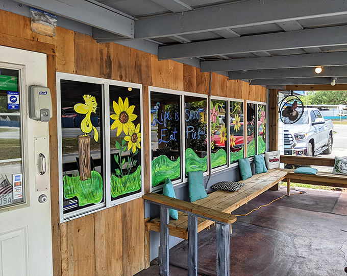 Even the windows celebrate Southern charm with hand-painted sunflowers. When a restaurant's exterior is this inviting, imagine what awaits inside.