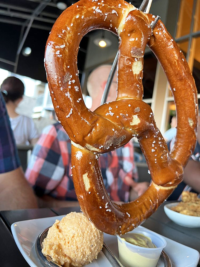 That towering pretzel isn't just a snack &ndash; it's a golden monument to the art of perfect bar food.