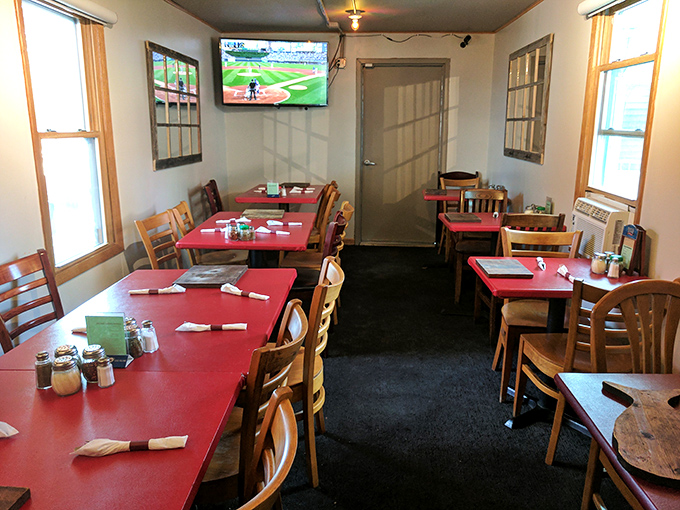 The private dining area offers a quieter pizza experience, with Cubs games providing the perfect Chicago soundtrack.