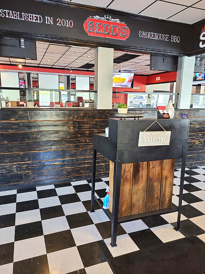 The "welcome" sign isn't just polite &ndash; it's an honest promise of what's to come when you cross that checkered floor