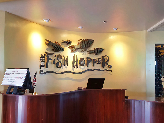The reception area welcomes you with metallic fish sculptures that seem to say, "You made the right choice swimming in here."