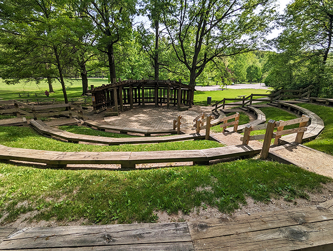 An outdoor amphitheater where the acoustics are provided by Mother Nature herself. Community performances feel more magical against this wooden backdrop. 
