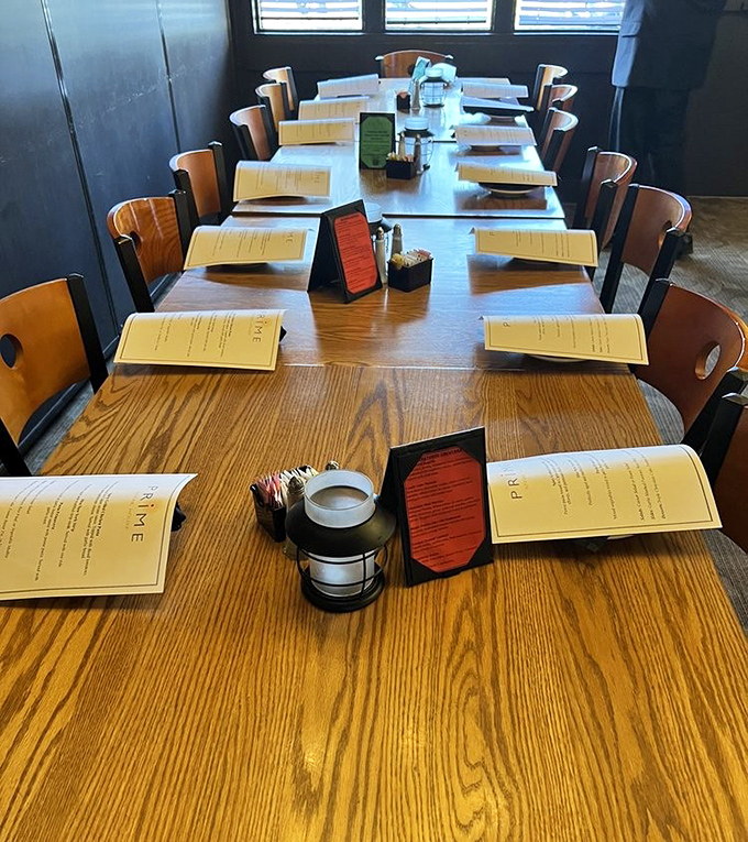A table set for anticipation—menus at attention, waiting to reveal their secrets to hungry guests about to embark on a culinary journey.