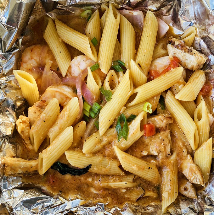 Pasta that doesn't just sit on the plate&mdash;it tells a story. Each bite of this shrimp and chicken penne delivers a perfect harmony of flavors.