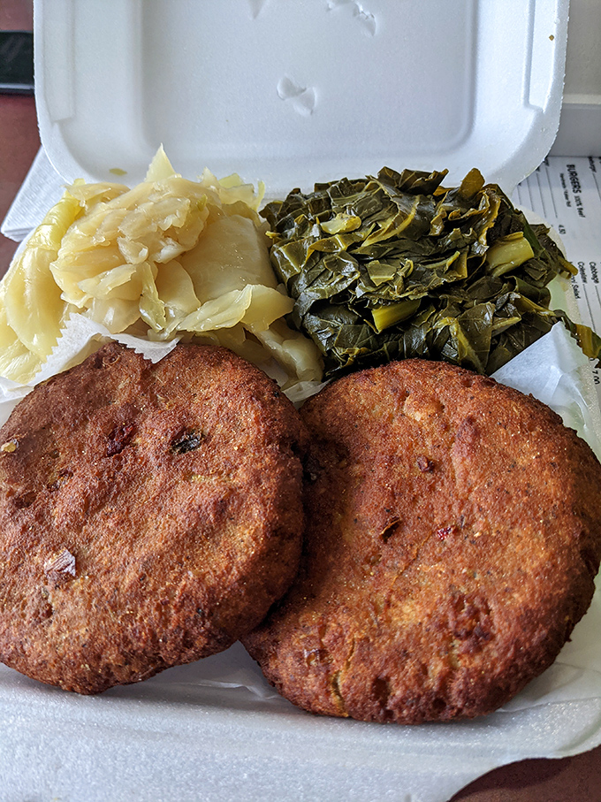 Salmon cakes with the ideal crisp exterior hiding flaky, herb-flecked interiors—the kind that make you wonder why you'd ever order anything else.