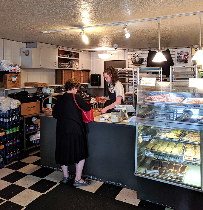 Behind this counter, magic happens. Not Harry Potter magic, but the equally impressive transformation of simple ingredients into transcendent donuts.