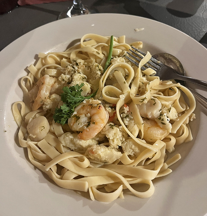 Fettuccine alfredo that twirls around plump shrimp like dancers at a pasta prom. Comfort food elevated without losing its soul.