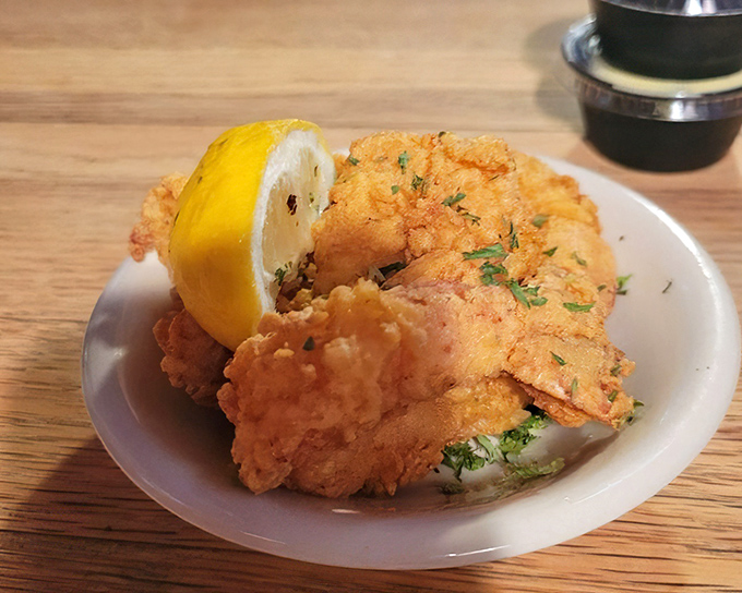 These golden-fried shrimp with a lemon wedge aren't just seafood&mdash;they're little treasures from Florida waters, each one a perfect bite of coastal sunshine.