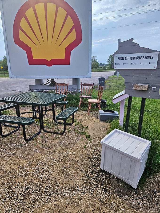 The perfect pit stop setup &ndash; grab a snack, rest your legs, and contemplate why more gas stations don't have giant pink mascots.