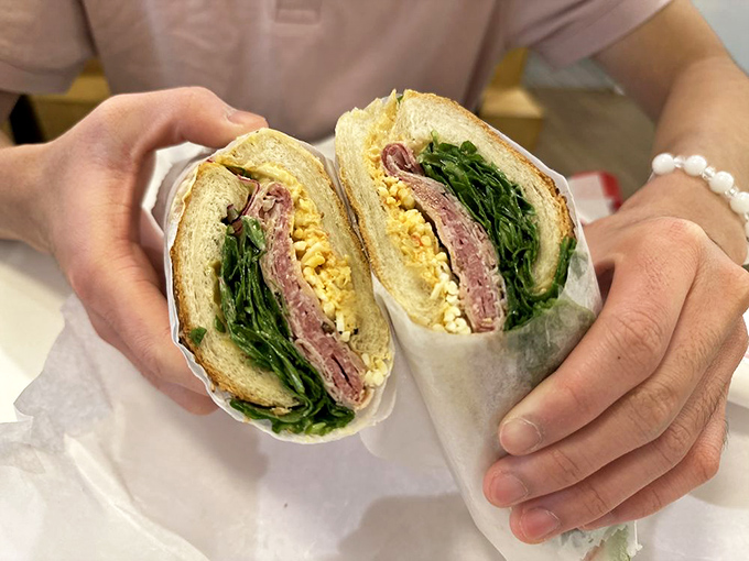 The So Long Sal sandwich is architectural perfection&mdash;each layer visible like geological strata of deliciousness that would make any geologist hungry. 