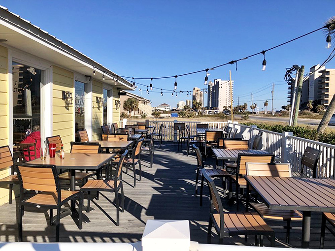 The patio where sea breezes enhance every bite. String lights overhead turn ordinary meals into those vacation moments you'll randomly remember in February.
