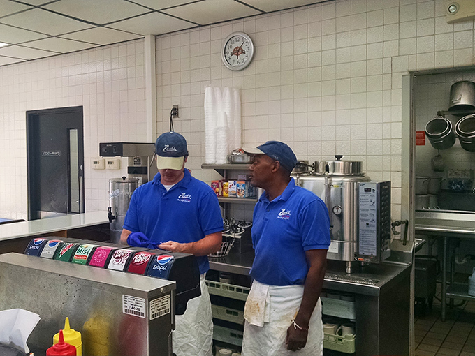 Behind the scenes where the magic happens &ndash; skilled hands crafting comfort food with the precision of seasoned professionals.