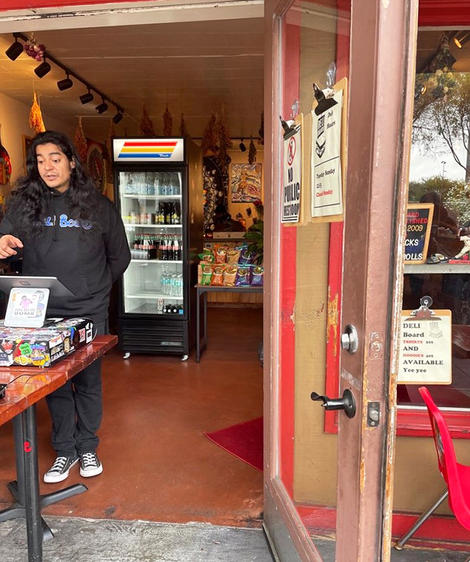 The staff knows they're guardians of a sacred sandwich tradition. That refrigerator holds liquid treasures to complement your meal.