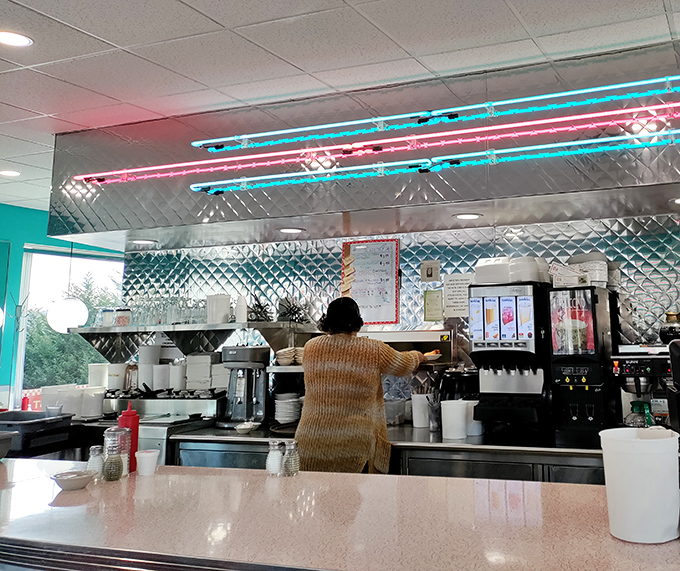 Behind those stainless steel counters and neon lights, culinary magic happens with the efficiency of a Swiss watch and warmth of a Pennsylvania welcome.