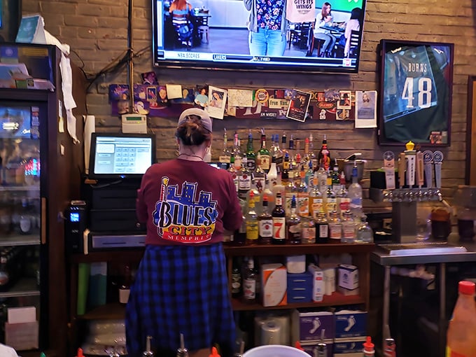 Staff wearing their Blues City pride like a badge of honor, serving up Southern hospitality alongside those famous plates.