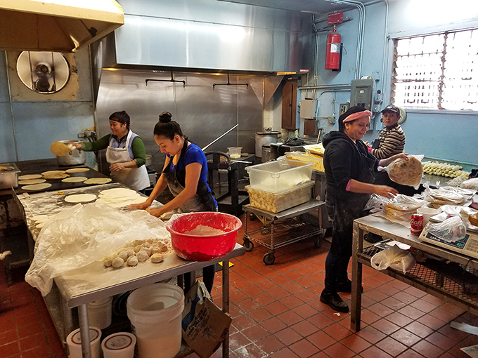 The tortilla assembly line where magic happens daily. No machines, no shortcuts&mdash;just hands that know exactly what they're doing.