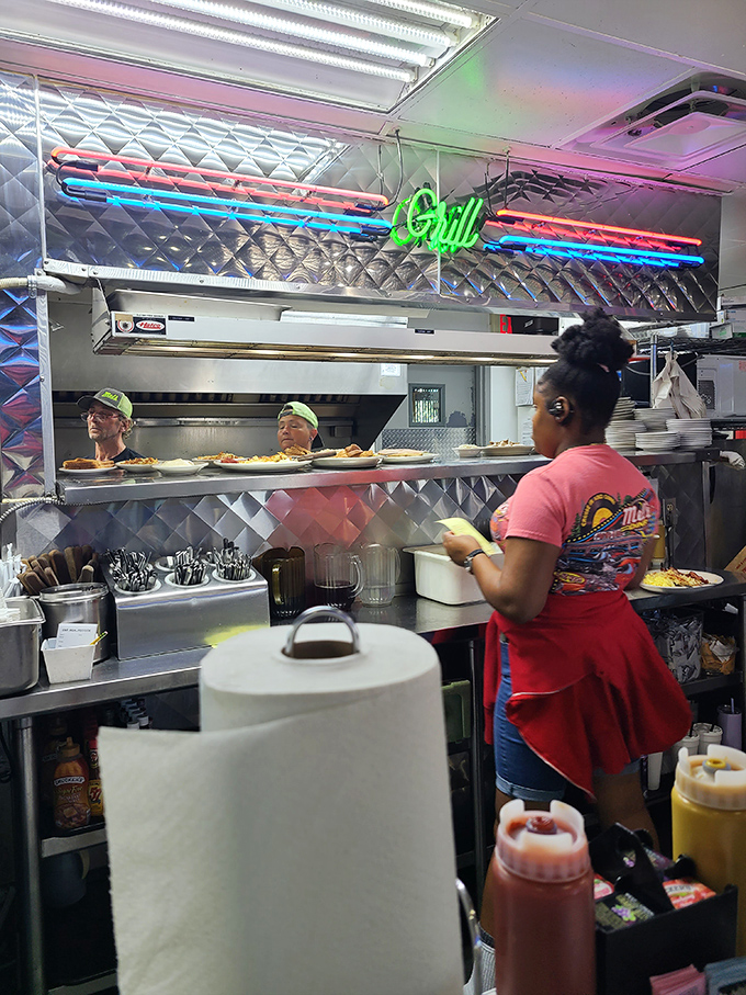 Behind every perfect plate is a team moving with the choreographed precision of Broadway dancers who just happen to be wielding spatulas.