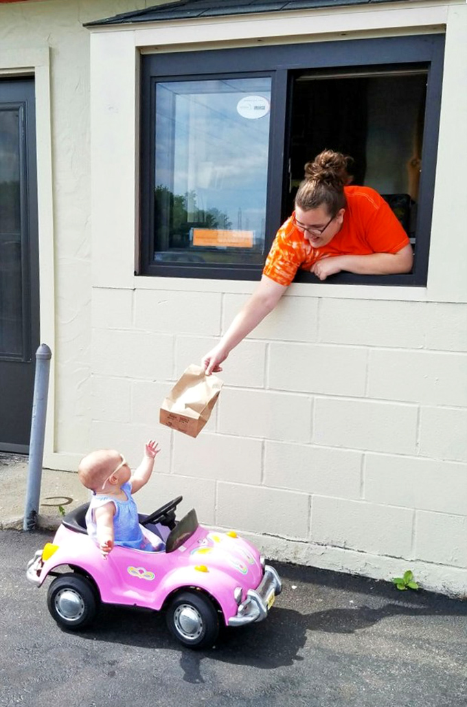 The true magic of drive-ins: where even the youngest customers arrive in style and service comes with a genuine smile. 