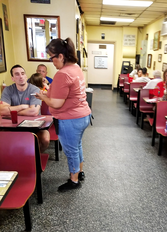 The server-customer dance that's been perfected over countless mornings - where your coffee cup never reaches empty.