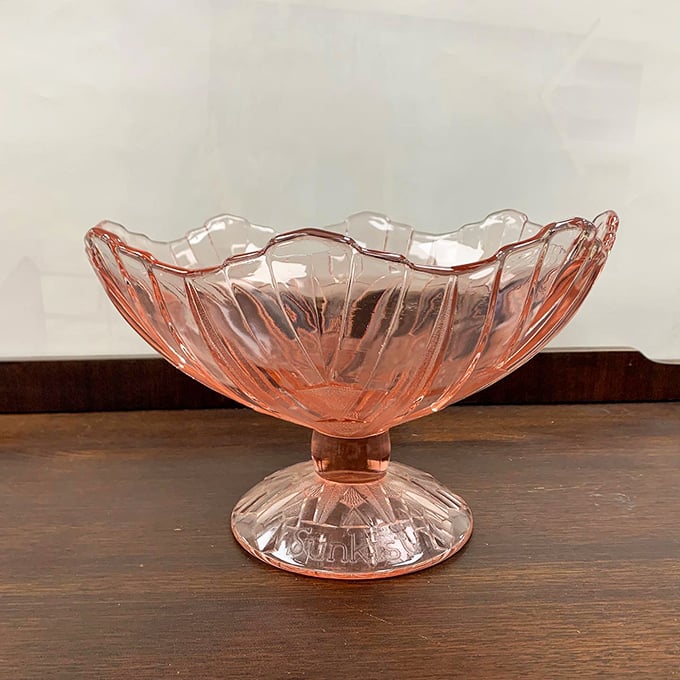 Depression glass with a sunny disposition. This delicate pink compote has probably served everything from ambrosia salad to holiday candies.