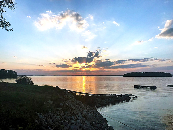Sunset paints Lake Hartwell in watercolor hues that would make Bob Ross reach for his palette and whisper "happy little clouds."