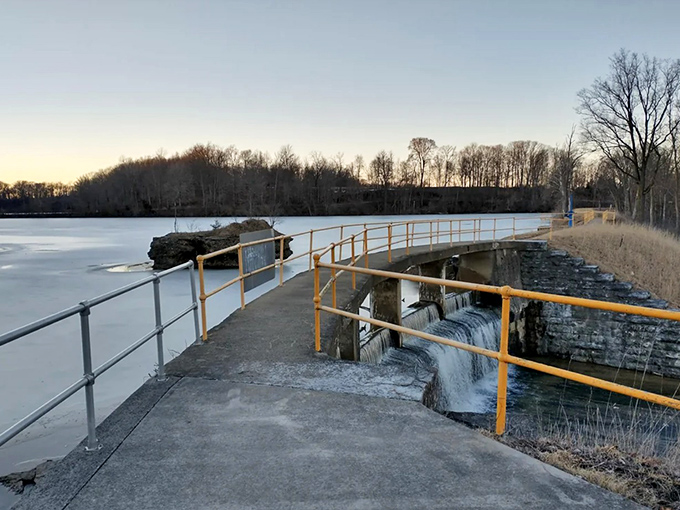 Swift Run Lake's spillway creates a mesmerizing winter scene. Half frozen, half flowing – much like retirees who are active but appreciate a good nap.