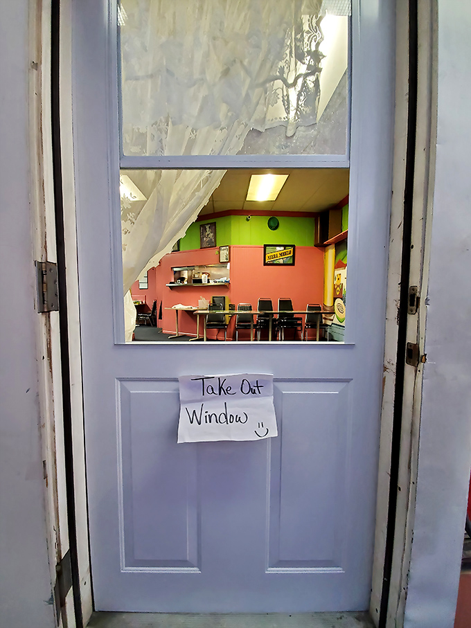 "Take Out Window" written with the kind of charming simplicity that tells you they're focused on the food, not fancy signage.