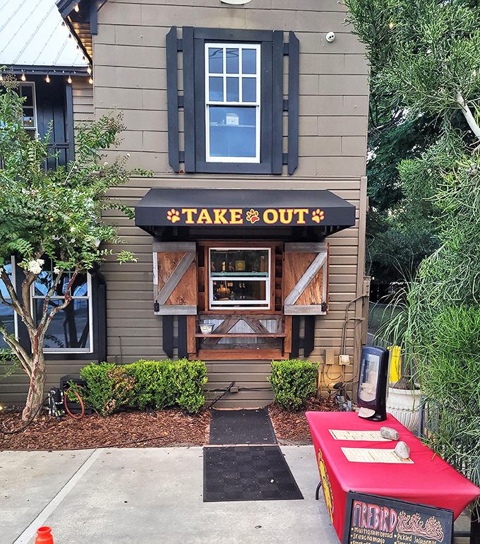 The take-out window promises all the flavor with none of the waiting, like a drive-through designed by someone who actually cares about food.