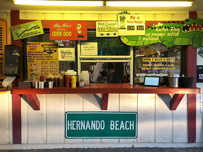 The order counter at Hernando Beach location showcases their specialty dogs &ndash; including the legendary "Gator Dog" that puts Florida right on your plate.