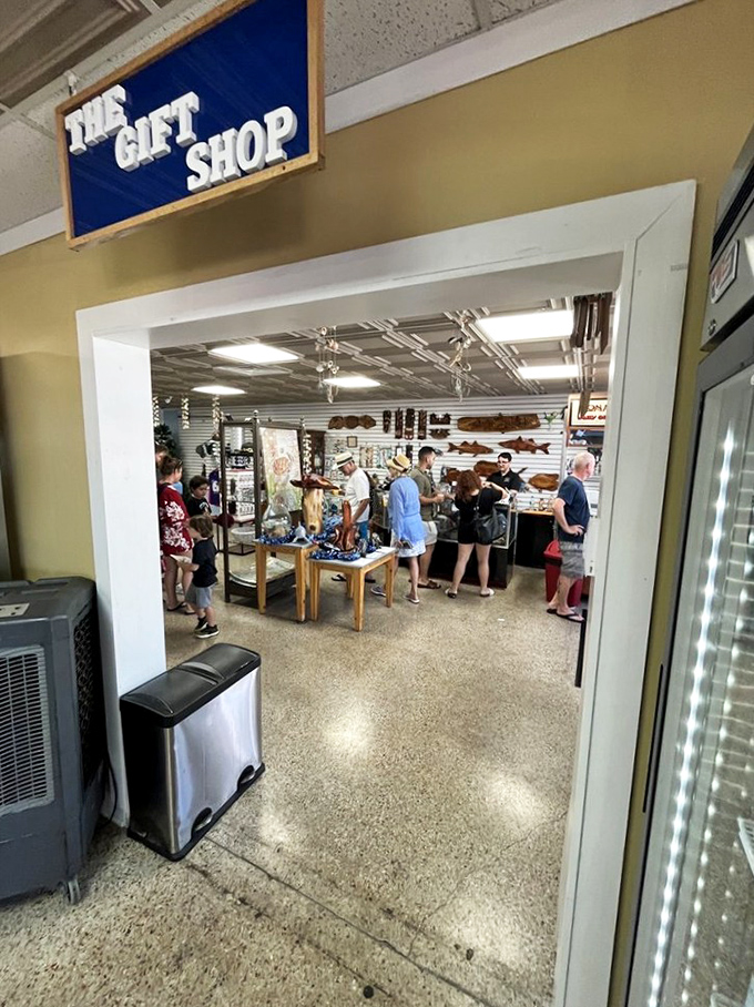 The gift shop isn't an afterthought—it's where locals stock up on coastal treasures while waiting for tables. Florida retail therapy at its finest.