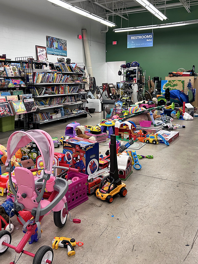 The children's area explodes with colorful toys, where budget-conscious parents find barely-used items that will be outgrown just as quickly.