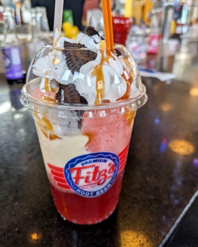 This isn't just a float&mdash;it's a carnival in a cup, where whipped cream mountains meet colorful soda seas. Spoons required!