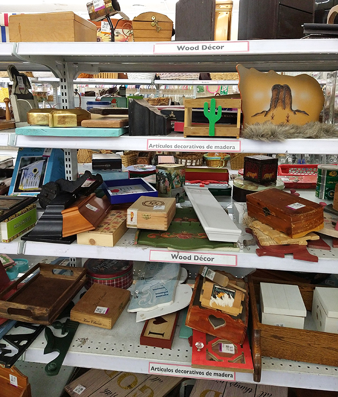 Desert-inspired wooden d&eacute;cor with bilingual labels reflects Arizona's cultural heritage&mdash;from cacti to cowboy motifs, all awaiting new homes.