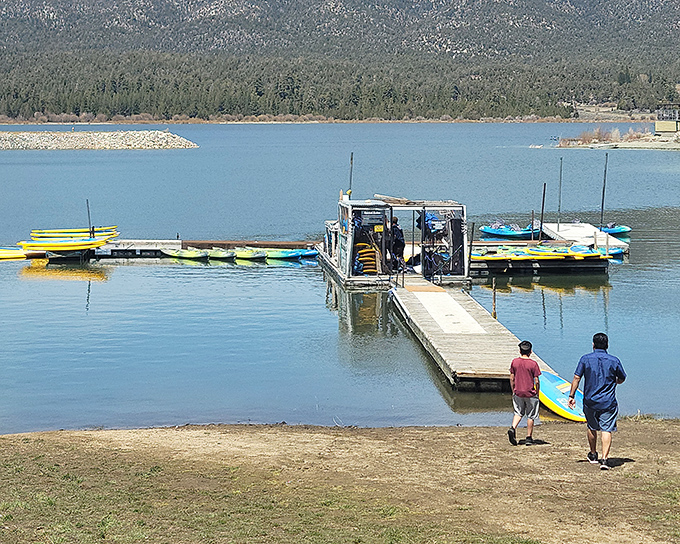 Summer's playground awaits as colorful kayaks and paddleboards stand ready for water adventures&mdash;no experience required, just a willingness to get wet.
