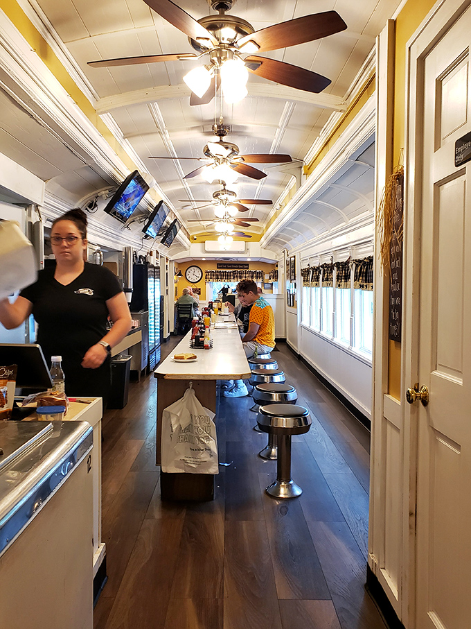 The counter view &ndash; where regulars perch like birds on a wire, watching the breakfast ballet unfold. Ceiling fans keep the gossip circulating.