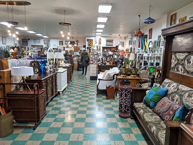 The distinctive turquoise and cream checkerboard floor guides you through aisles of furniture that each tell a different story.