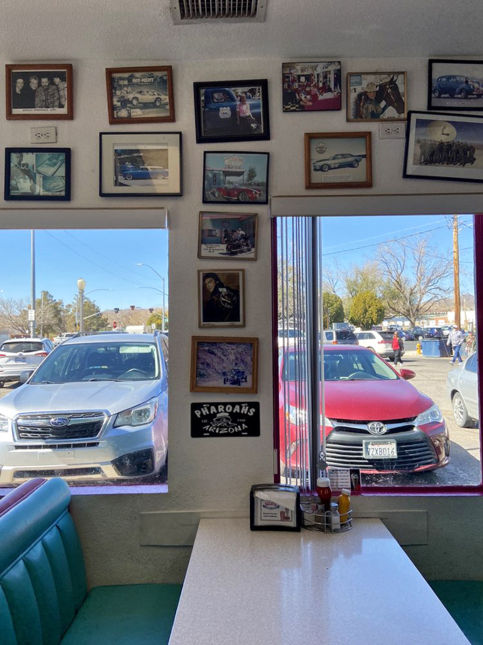 Every photo tells a story, and this wall tells the epic saga of American road culture, classic cars, and the people who loved them.